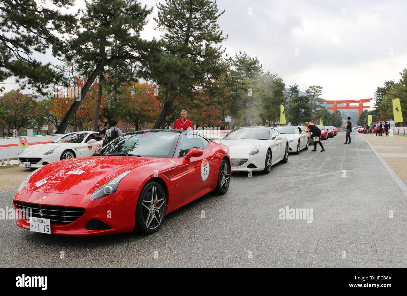Around 70 Ferraris are assembled in Japan's ancient capital of Kyoto on ...