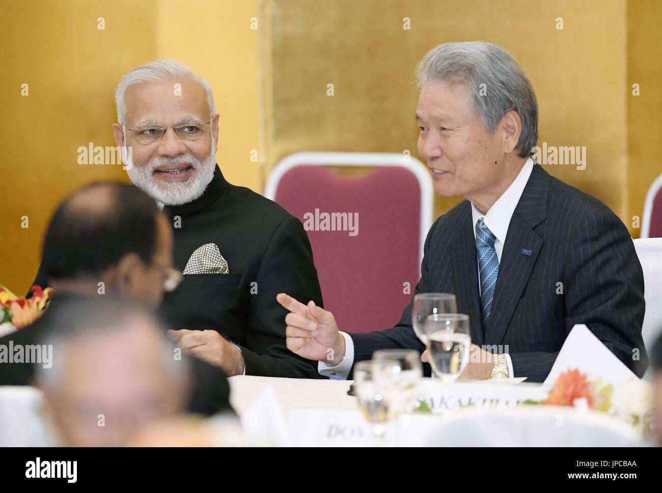 Indian Prime Minister Narendra Modi (L) and Sadayuki Sakakibara ...