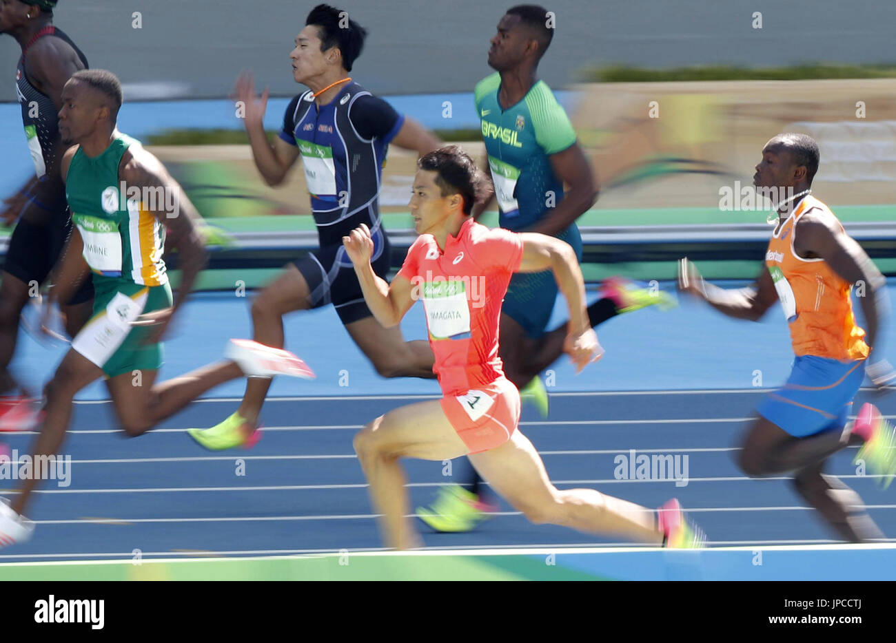 Sprinters run in the first round of the men's 100 meters at the Rio de ...