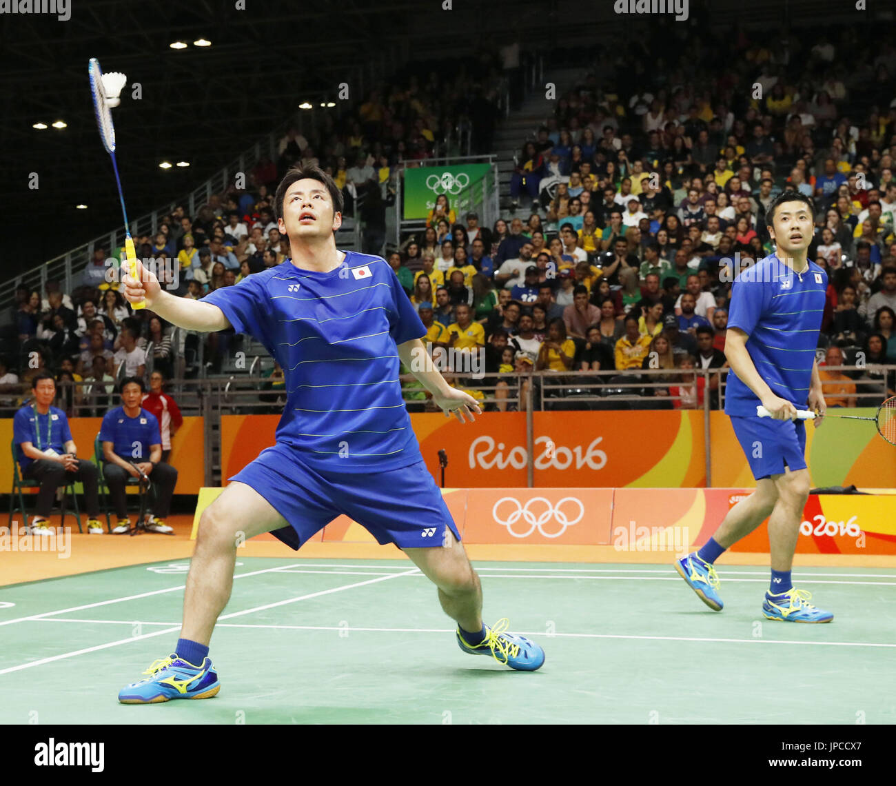 Japan's Kenichi Hayakawa (L) and Hiroyuki Endo compete against Manu ...