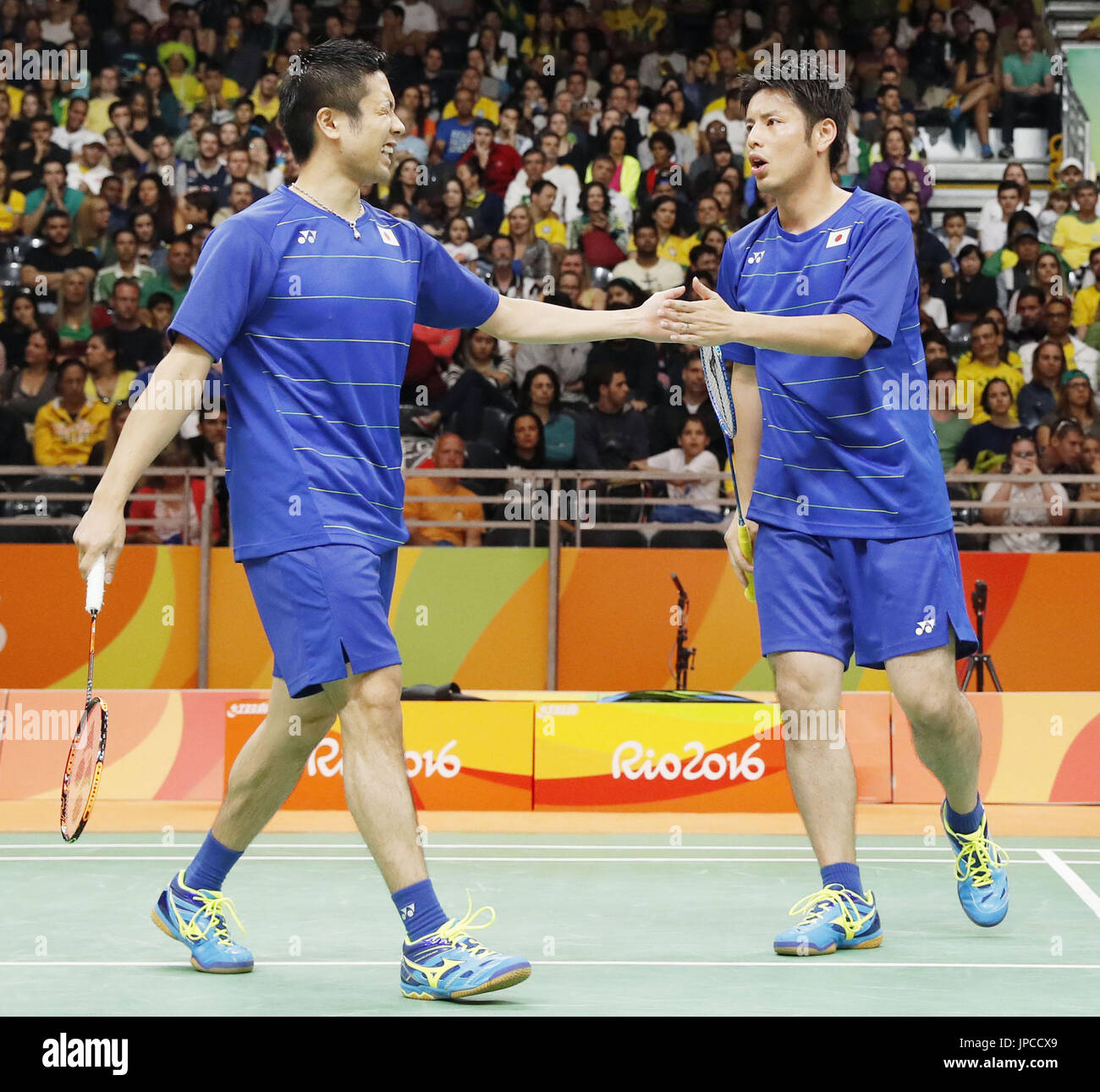 Japan's Kenichi Hayakawa (R) and Hiroyuki Endo celebrate after winning ...