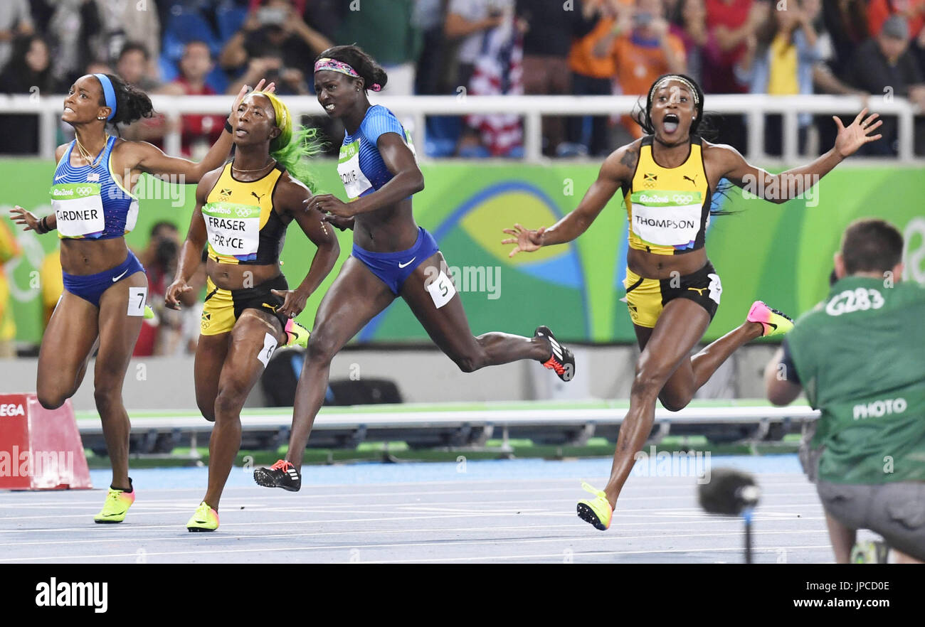 Jamaican sprinter Elaine Thompson (4th from L) wins the women's 100 ...