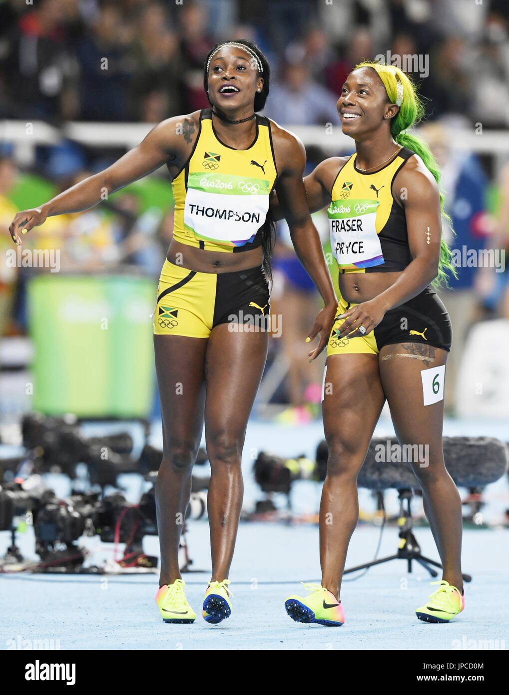 Jamaican sprinter Elaine Thompson (L) celebrates with compatriot Shelly ...