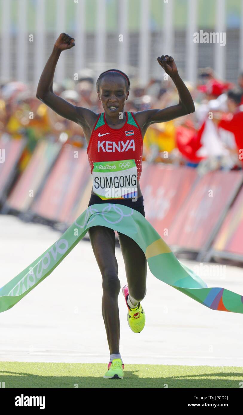 Kenya's Jemima Sumgong crosses the finish line to win the women's ...