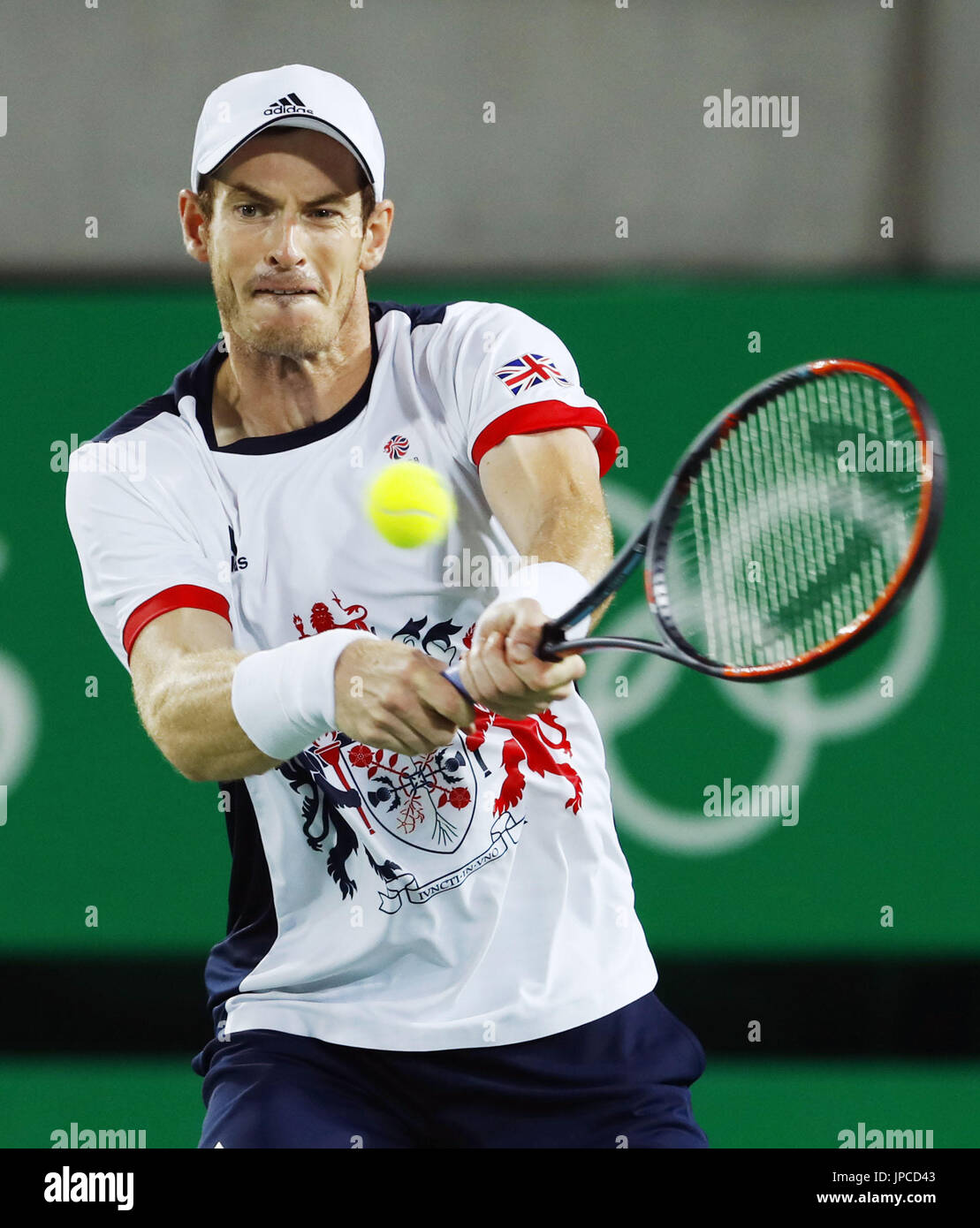 Andy Murray of Britain hits a backhand to Juan Martin del Potro of ...