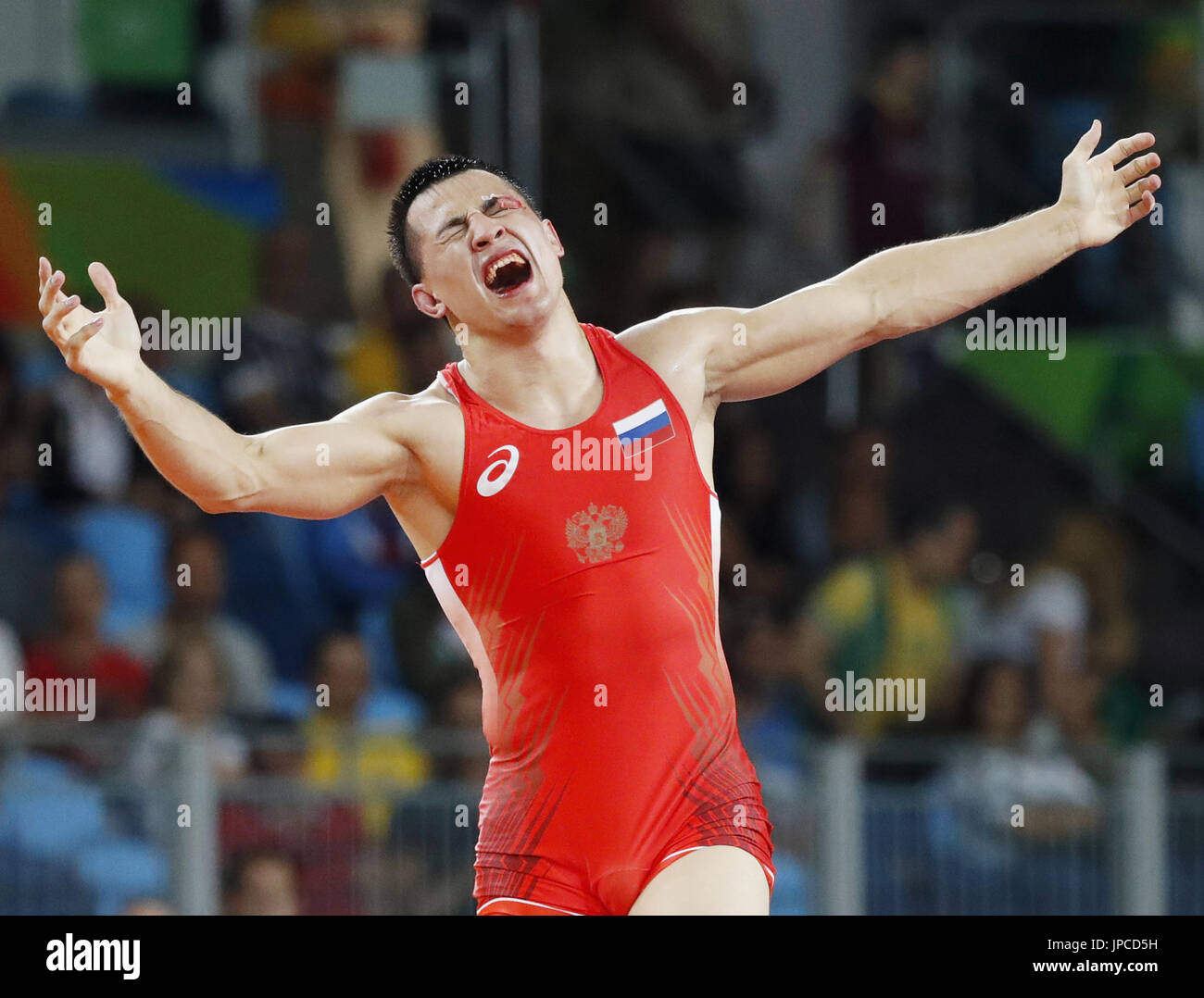Russia's Roman Vlasov celebrates after defeating Mark Overgaard Madsen ...