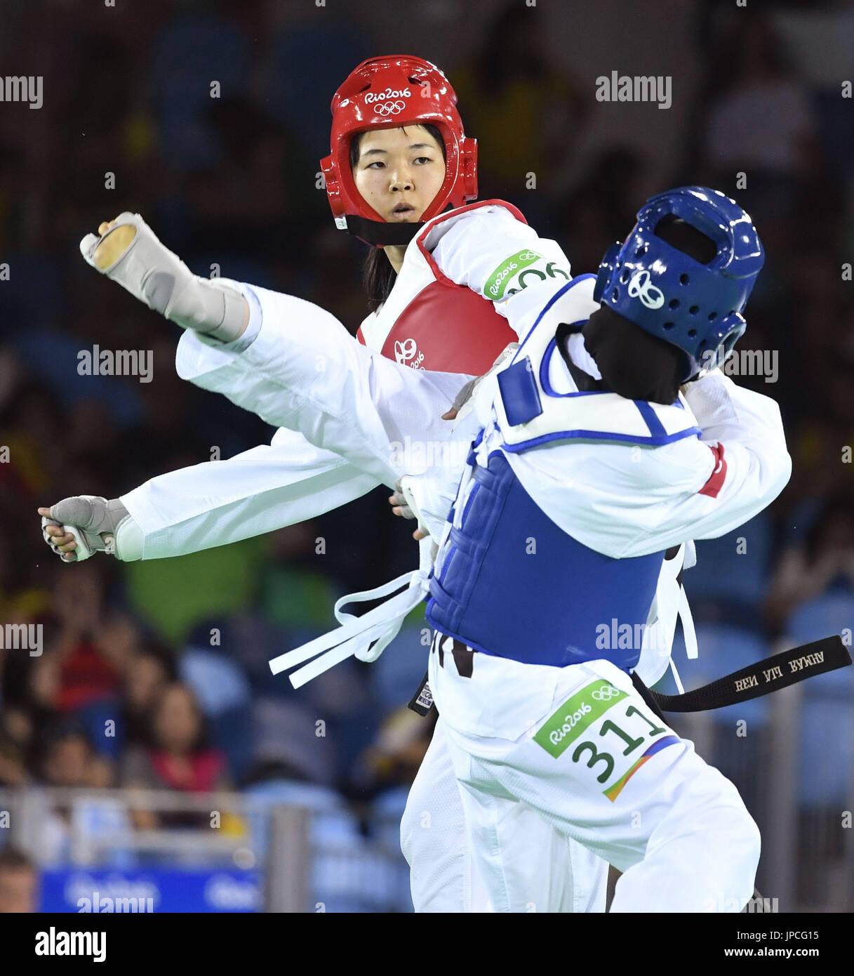 Japan's Mayu Hamada (back) competes against Rahma Ben Ali of Tunisia ...