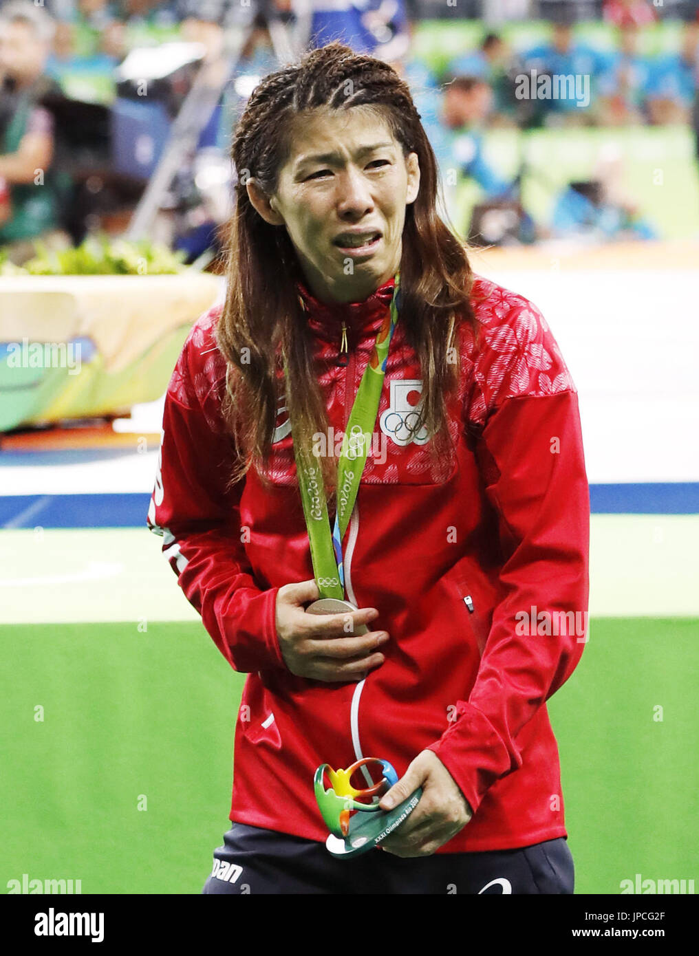 Silver medalist Saori Yoshida of Japan cries after the medal ceremony ...