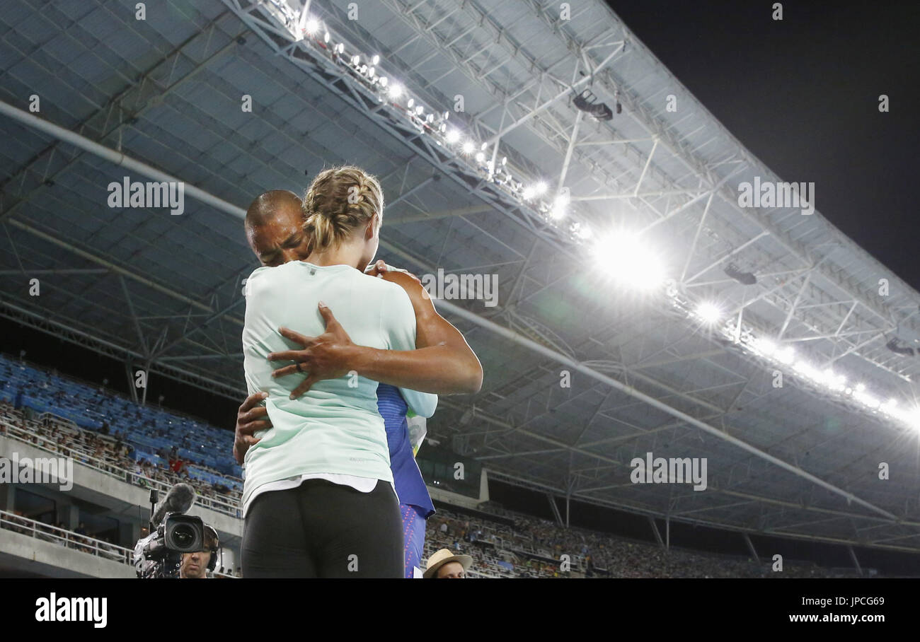 Ashton Eaton of the United States embraces his wife Brianne Theisen ...