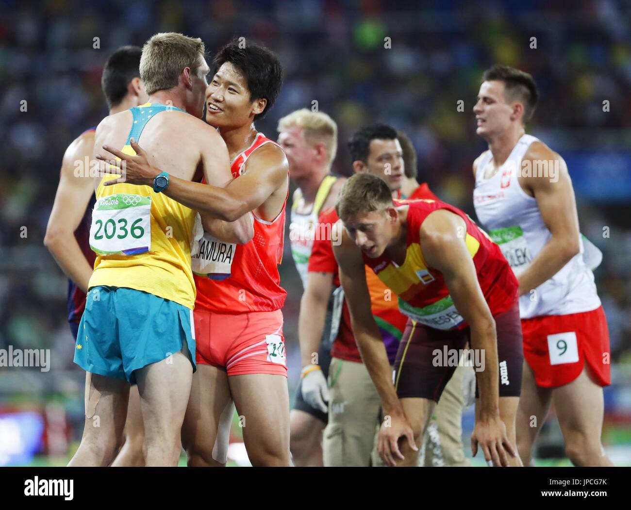 Competitors in the men's decathlon congratulate each other following ...