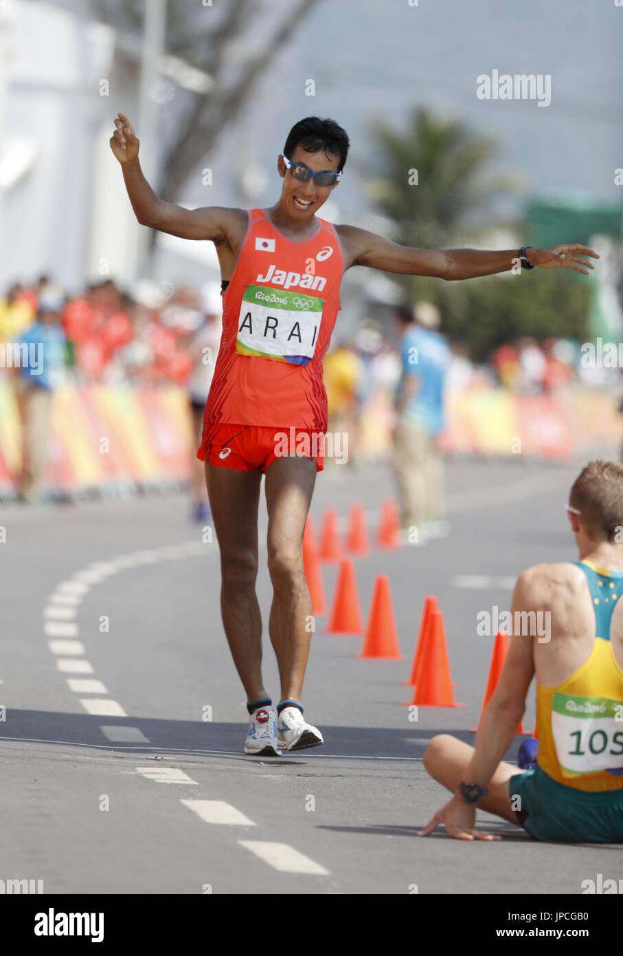 Japan's Hirooki Arai crosses the finish line in the men's 50-kilometer ...