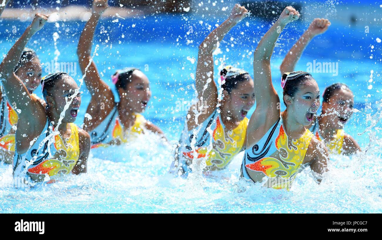 Japan's synchronized swimming team performs during the free routine ...