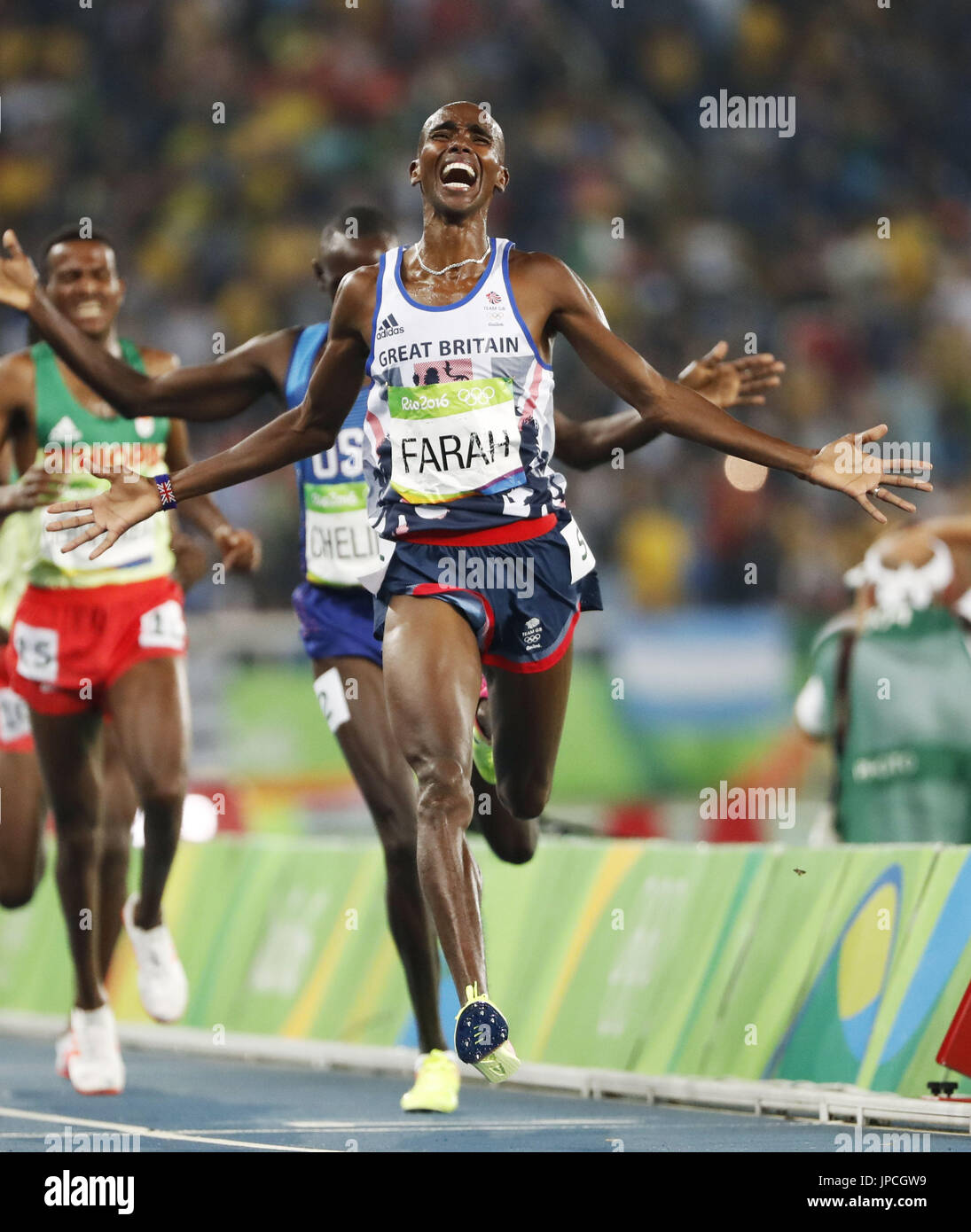 Mo Farah of Britain wins the gold medal in the men's 5000-meter final ...