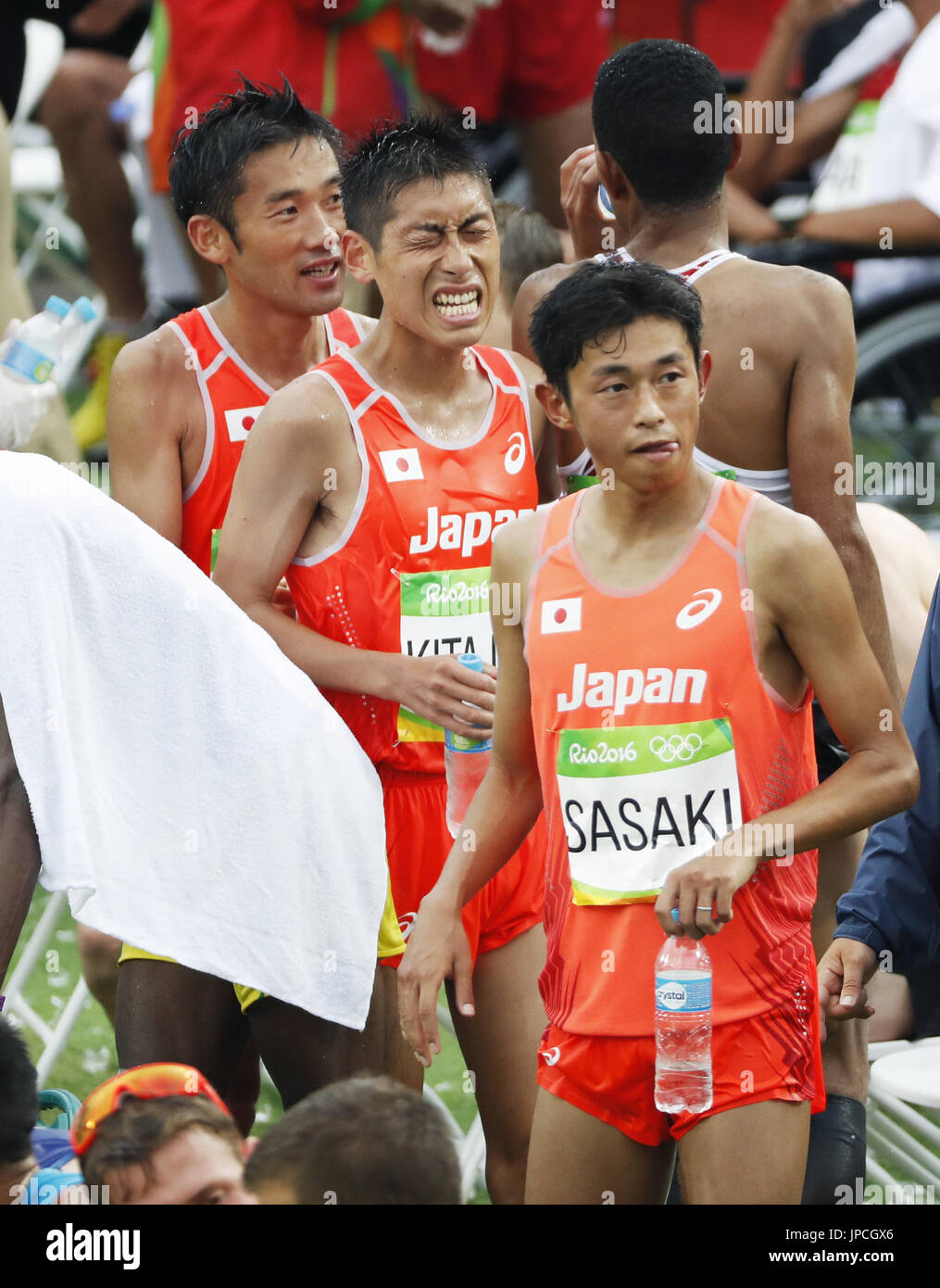 Japanese runners (from R) Satoru Sasaki, Hisanori Kitajima and Suehiro ...