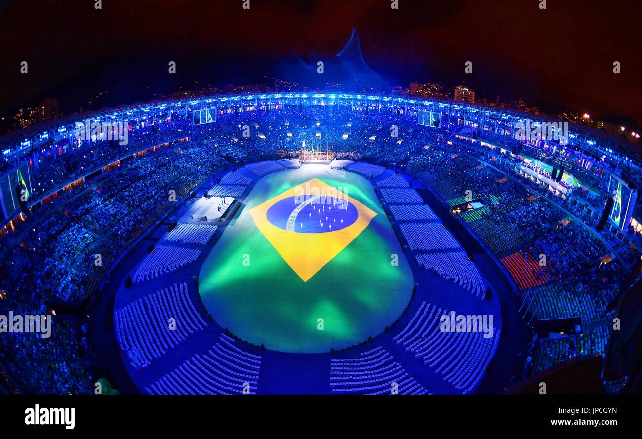 The Brazilian national flag is projected inside the Maracana Stadium ...