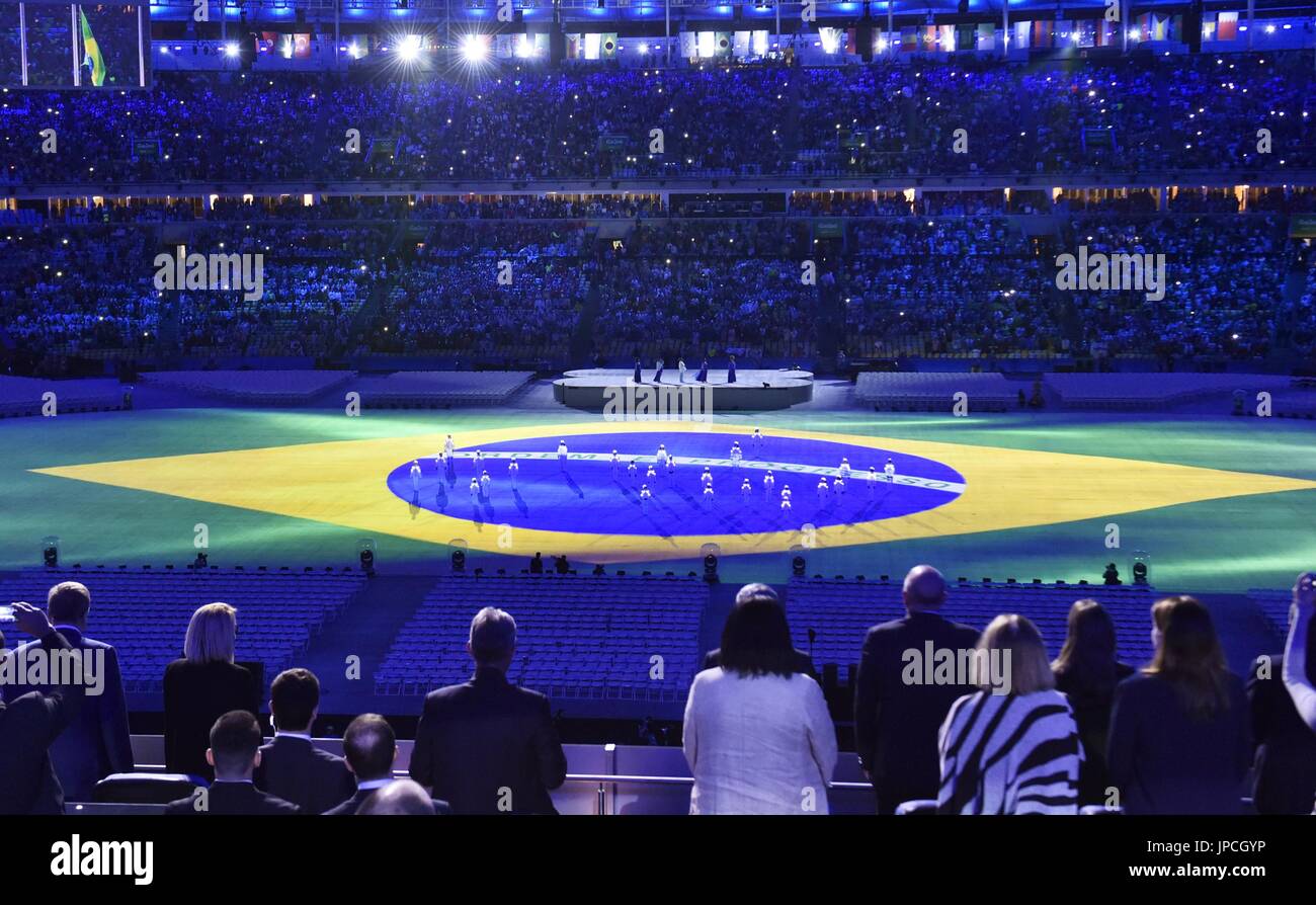 The Brazilian national flag is projected inside the Maracana Stadium ...