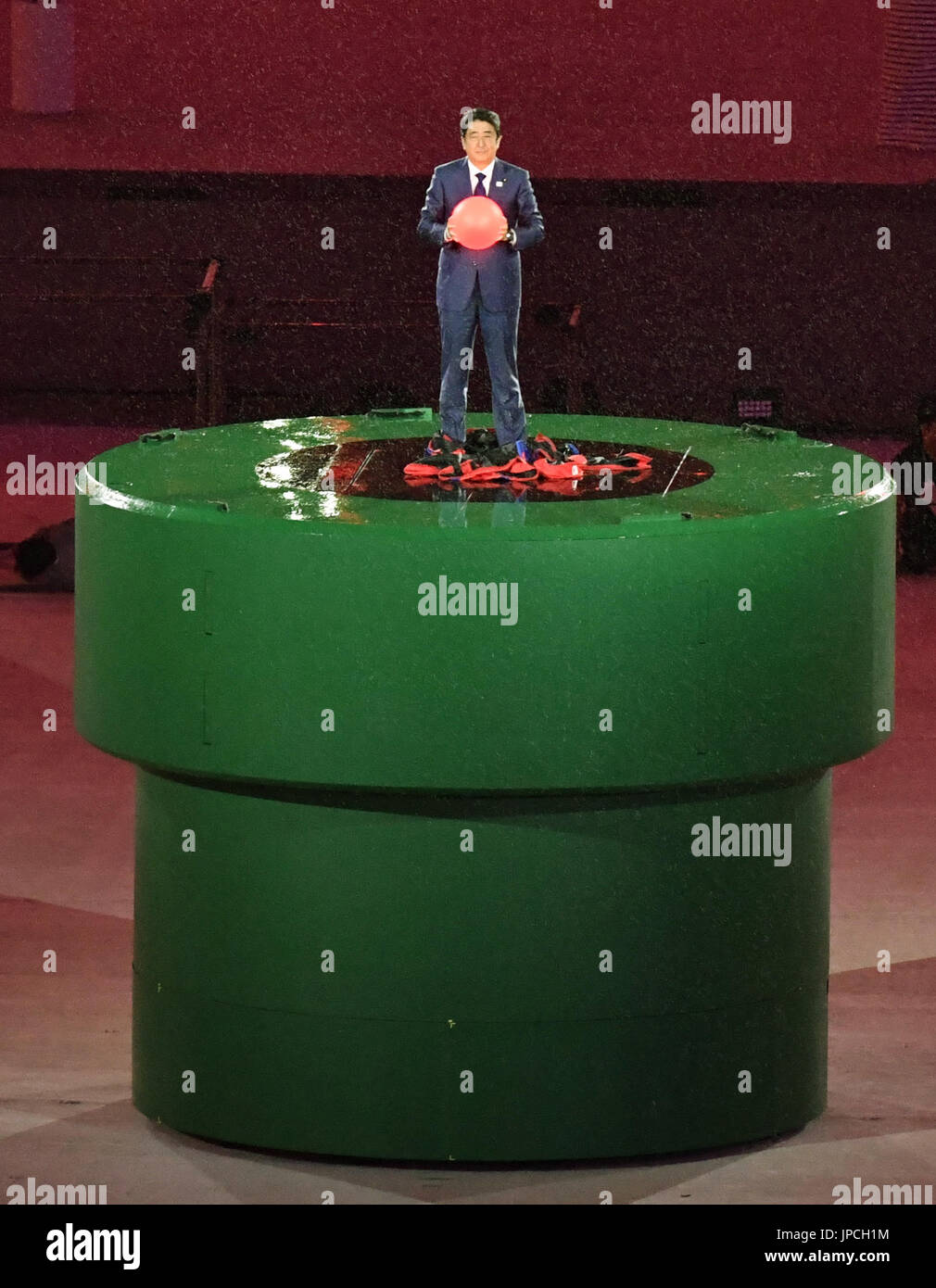 Japanese Prime Minister Shinzo Abe, dressed up as Super Mario, makes an ...