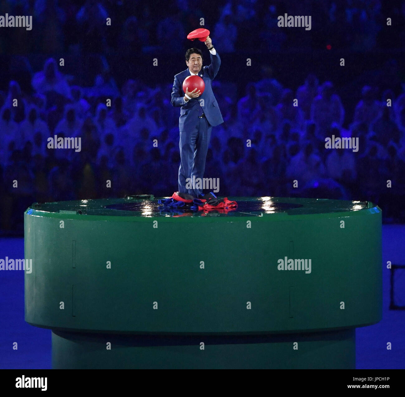 Japanese Prime Minister Shinzo Abe, dressed up as Super Mario, makes an ...