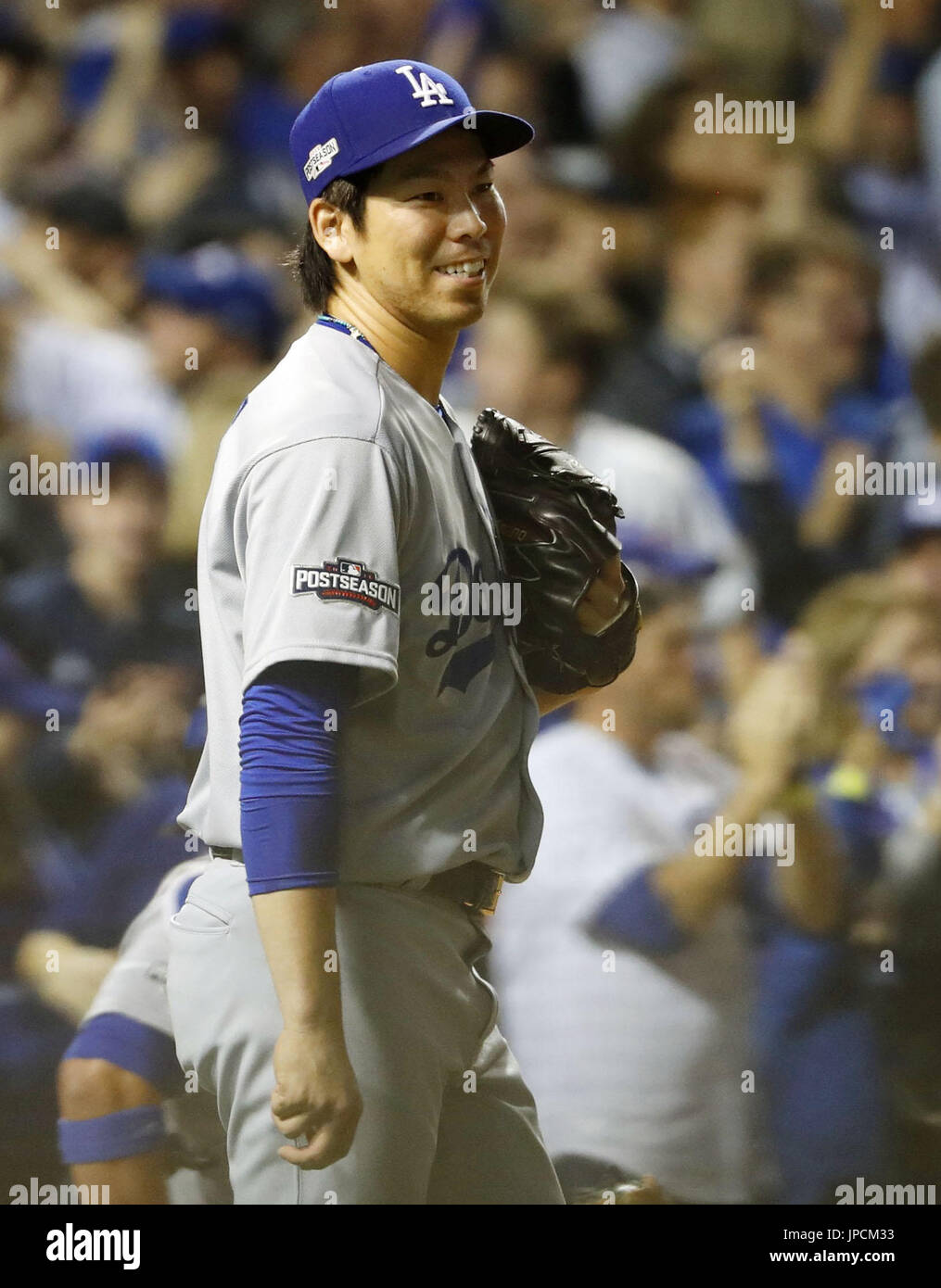 Los Angeles Dodgers starter Kenta Maeda reacts after giving up an RBI ...