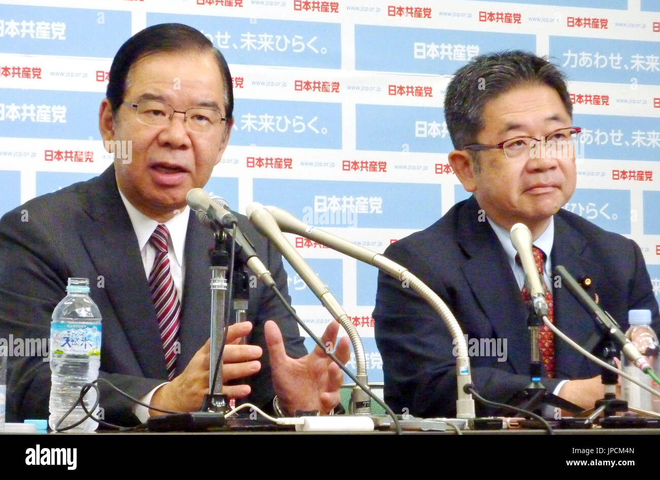 Japanese Communist Party leader Kazuo Shii (L) and Akira Koike, head of ...