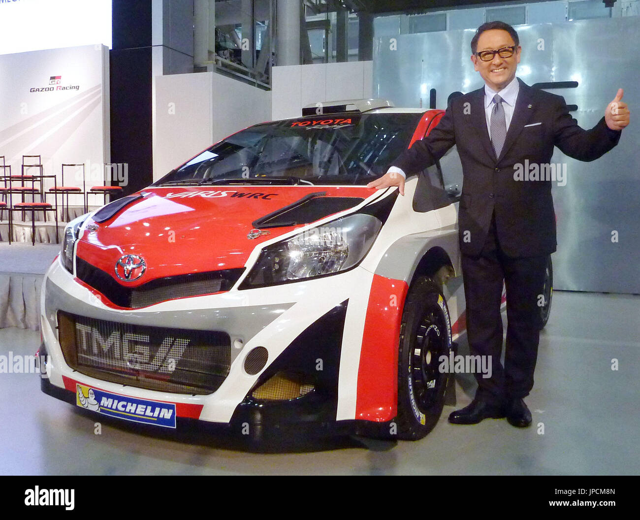 Toyota Motor Corp. President Akio Toyoda shows off a test model of the ...