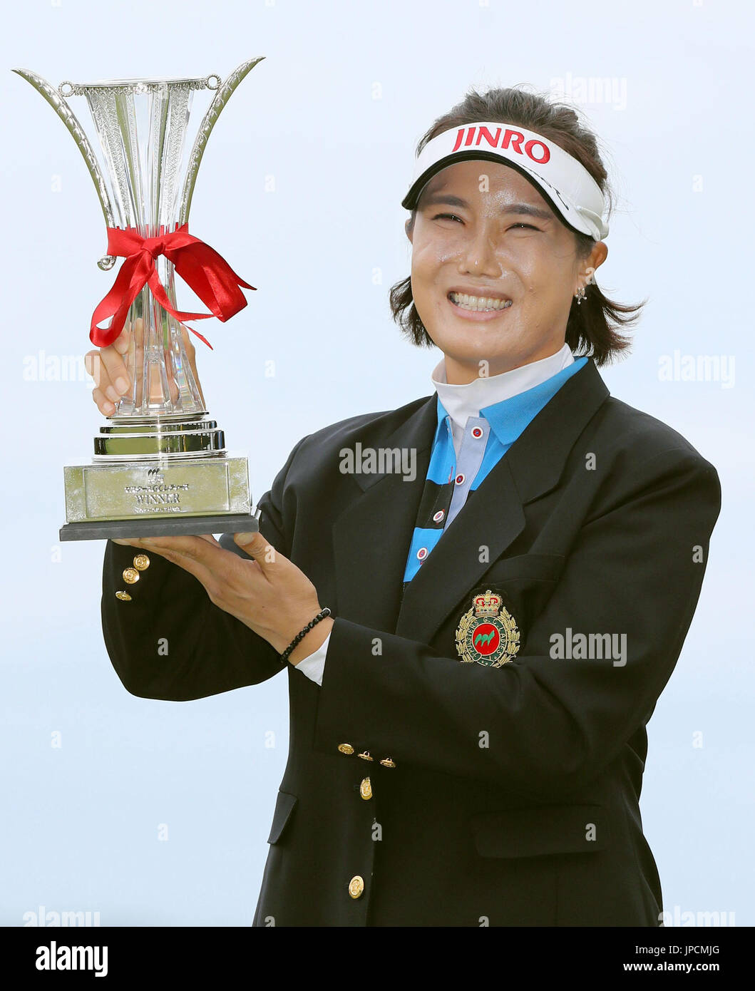 Jeon Mi Jeong of South Korea poses with the winner's trophy after ...