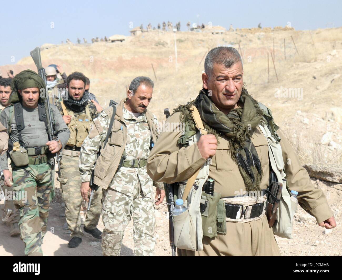 Peshmerga fighters from Iraq's Kurdistan autonomous region are deployed ...