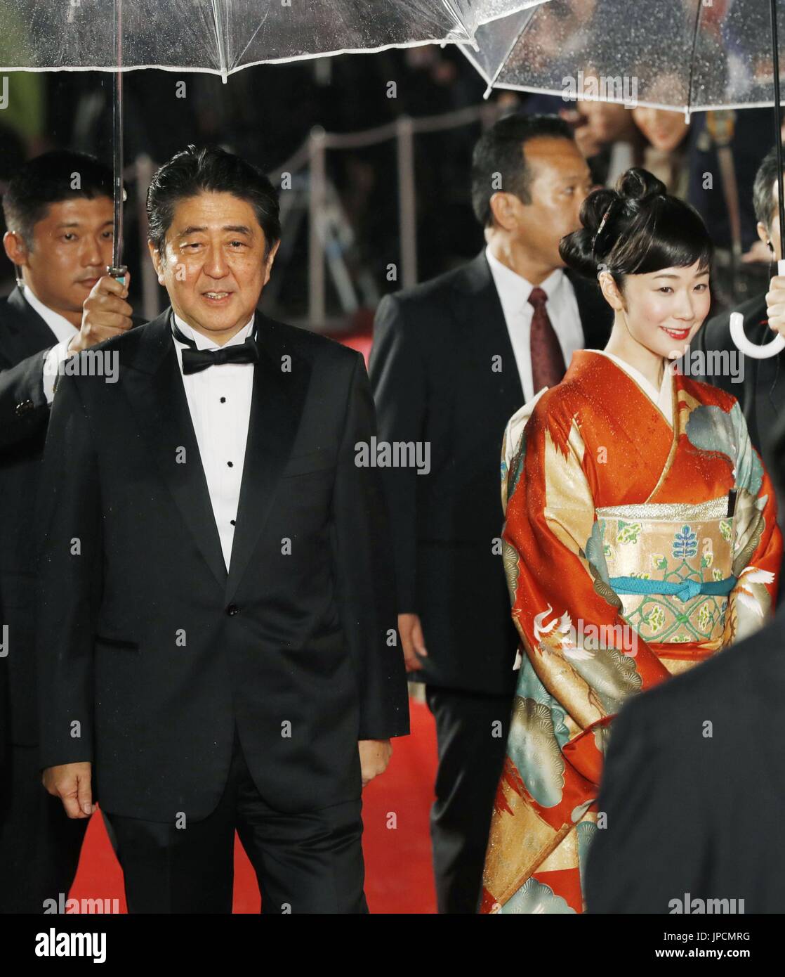 Japanese Prime Minister Shinzo Abe (L) and Japanese actress Haru Kuroki ...