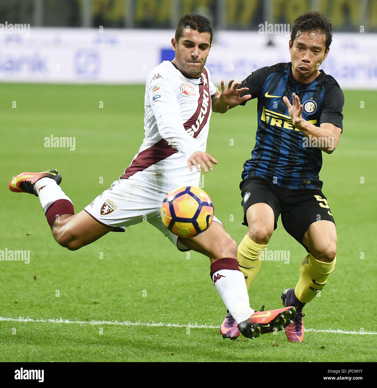 Inter Milan's Yuto Nagatomo (R) is seen in action during the first half ...