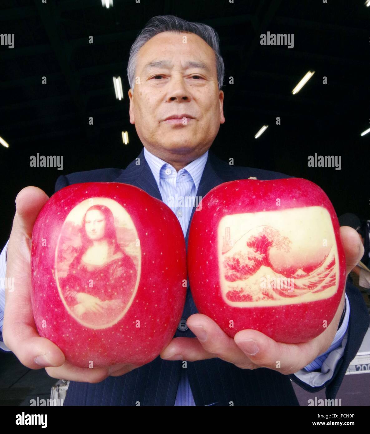 Yoshihiro Sato, who runs a company selling agricultural equipment ...
