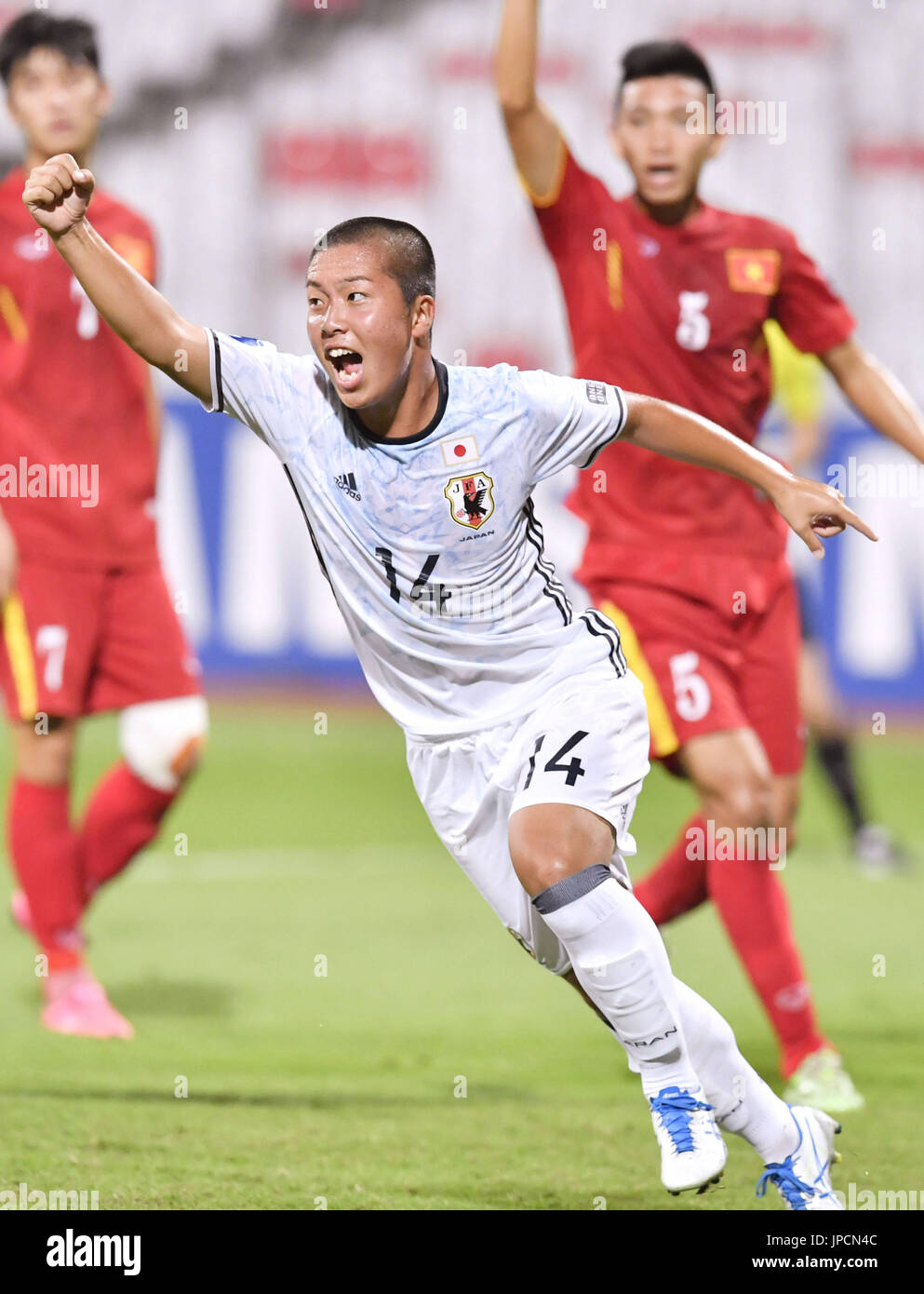 Shunta Nakamura (C) celebrates after scoring Japan's second goal ...