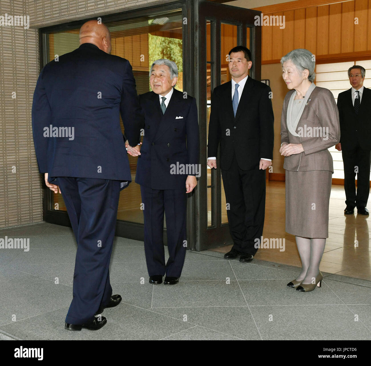 Lesotho King Letsie III (far L) is greeted by Japanese Emperor Akihito ...