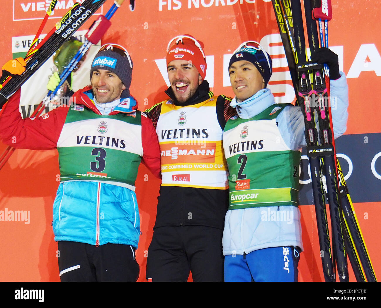 German Nordic combined skier Johannes Rydzek (C) poses for a photo in ...