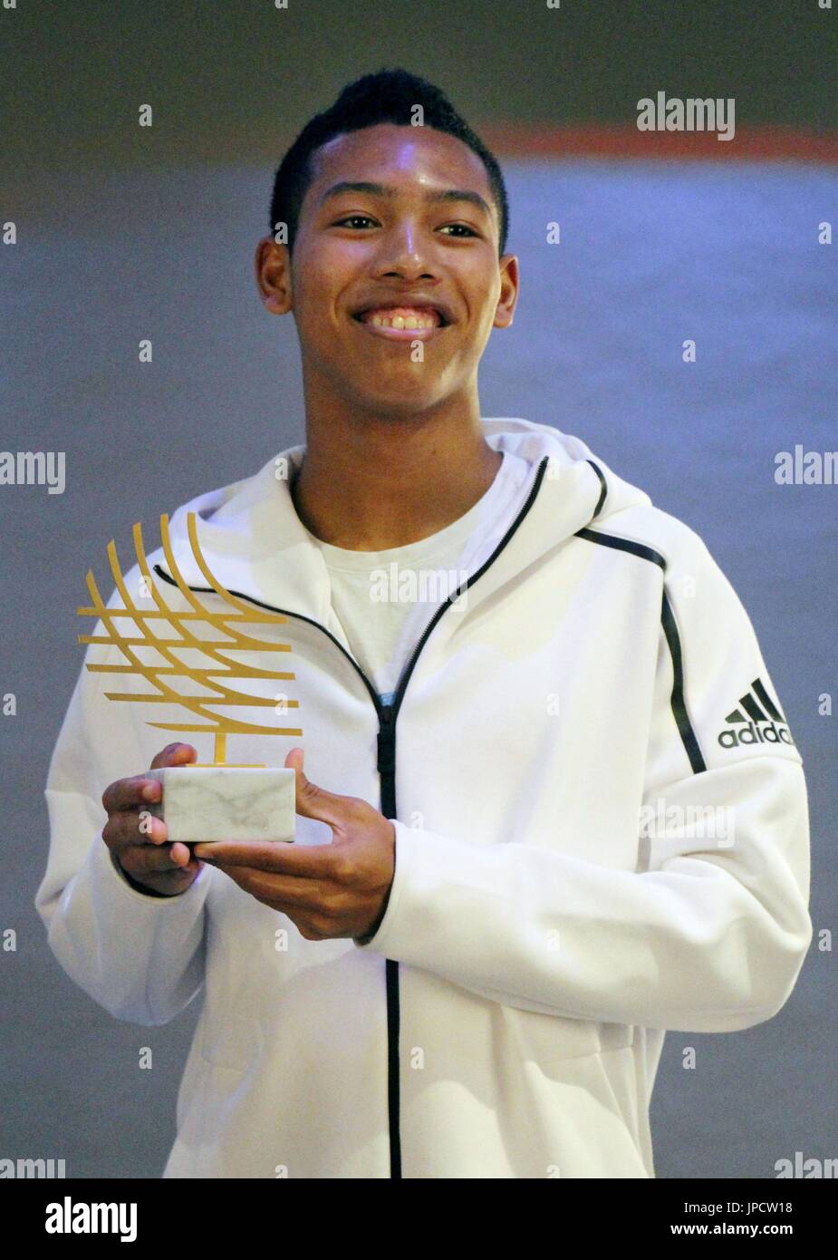 Japanese sprinter Abdul Hakim Sani Brown poses for photos on Dec. 1 ...