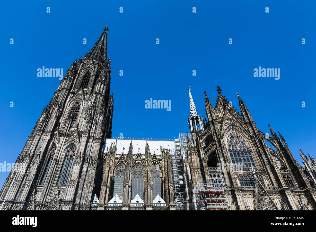 Cologne Cathedral low angle view from the side with blue sky Stock ...