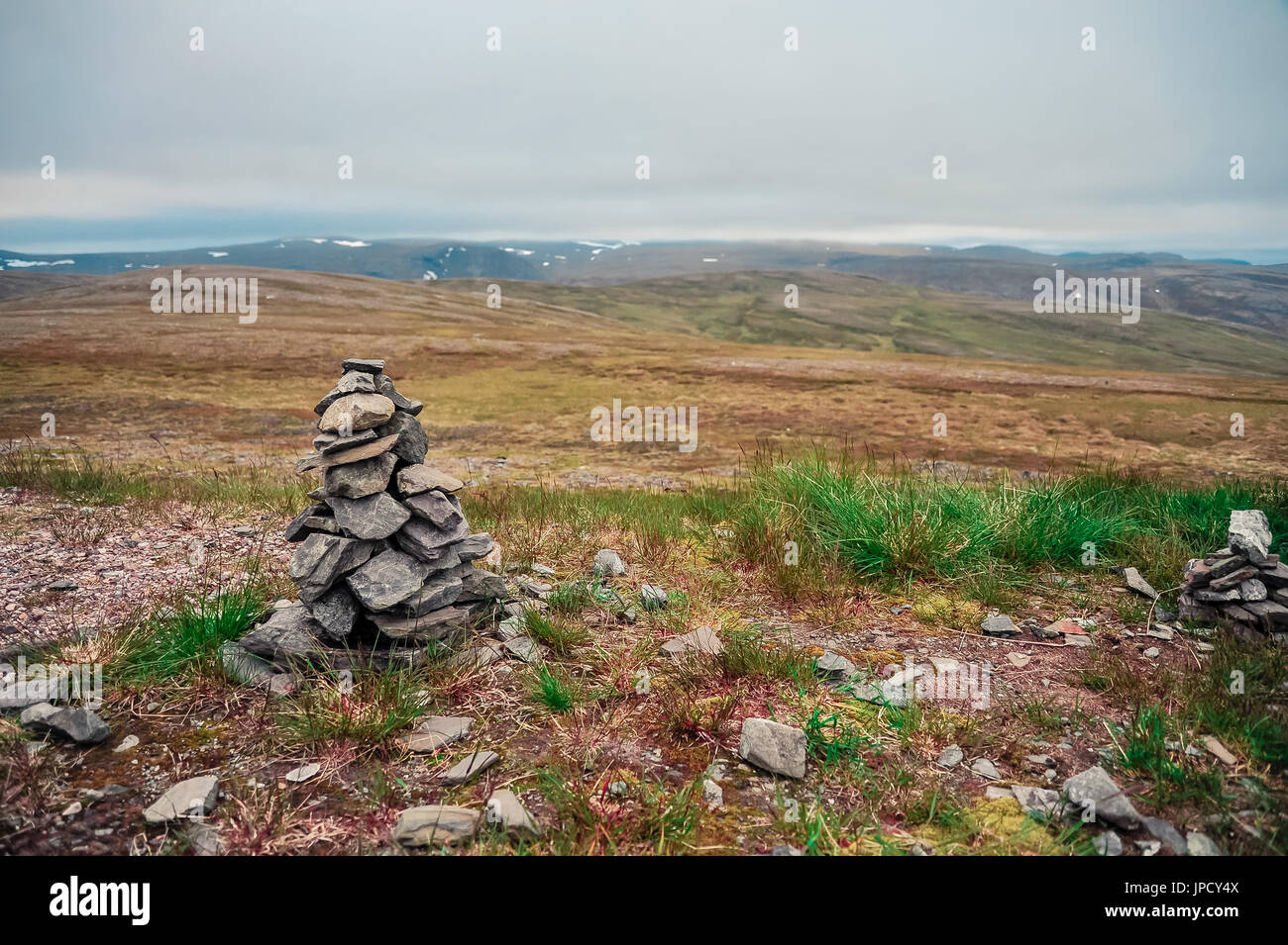 Small pile of rocks pyramid at North Cape (Nordkapp), Finnmark, Norway ...