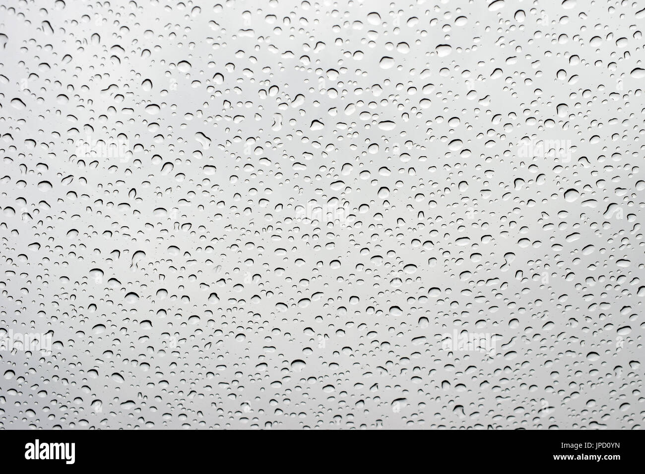 Drops of rain on a window glass Stock Photo - Alamy