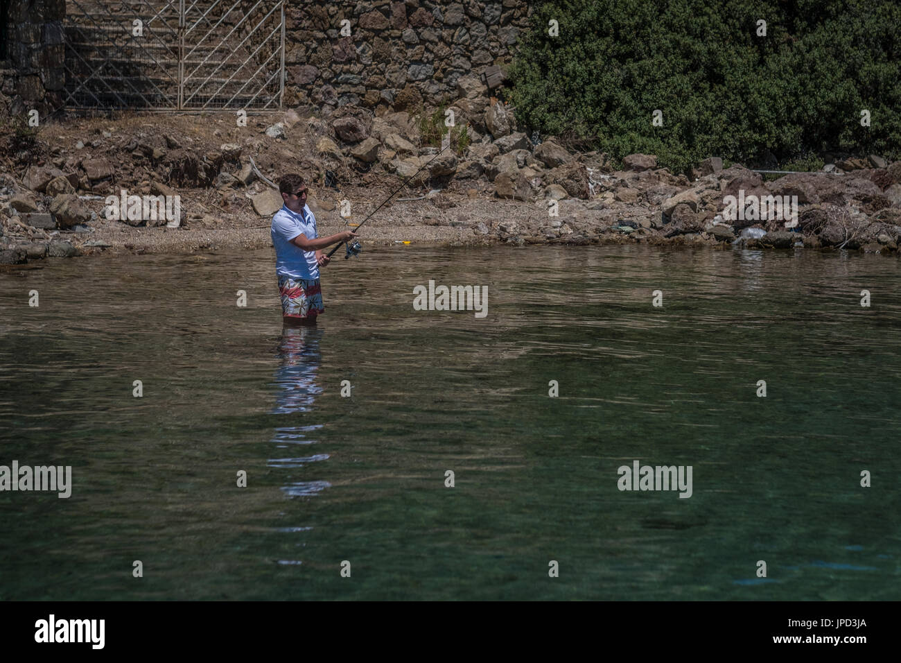 fisherman in the sea Stock Photo - Alamy