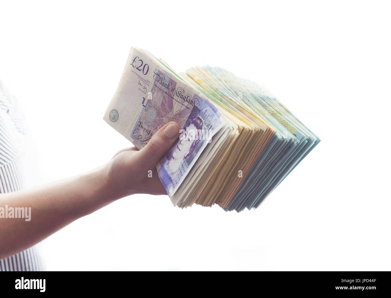 hand holding big stack of money Stock Photo - Alamy
