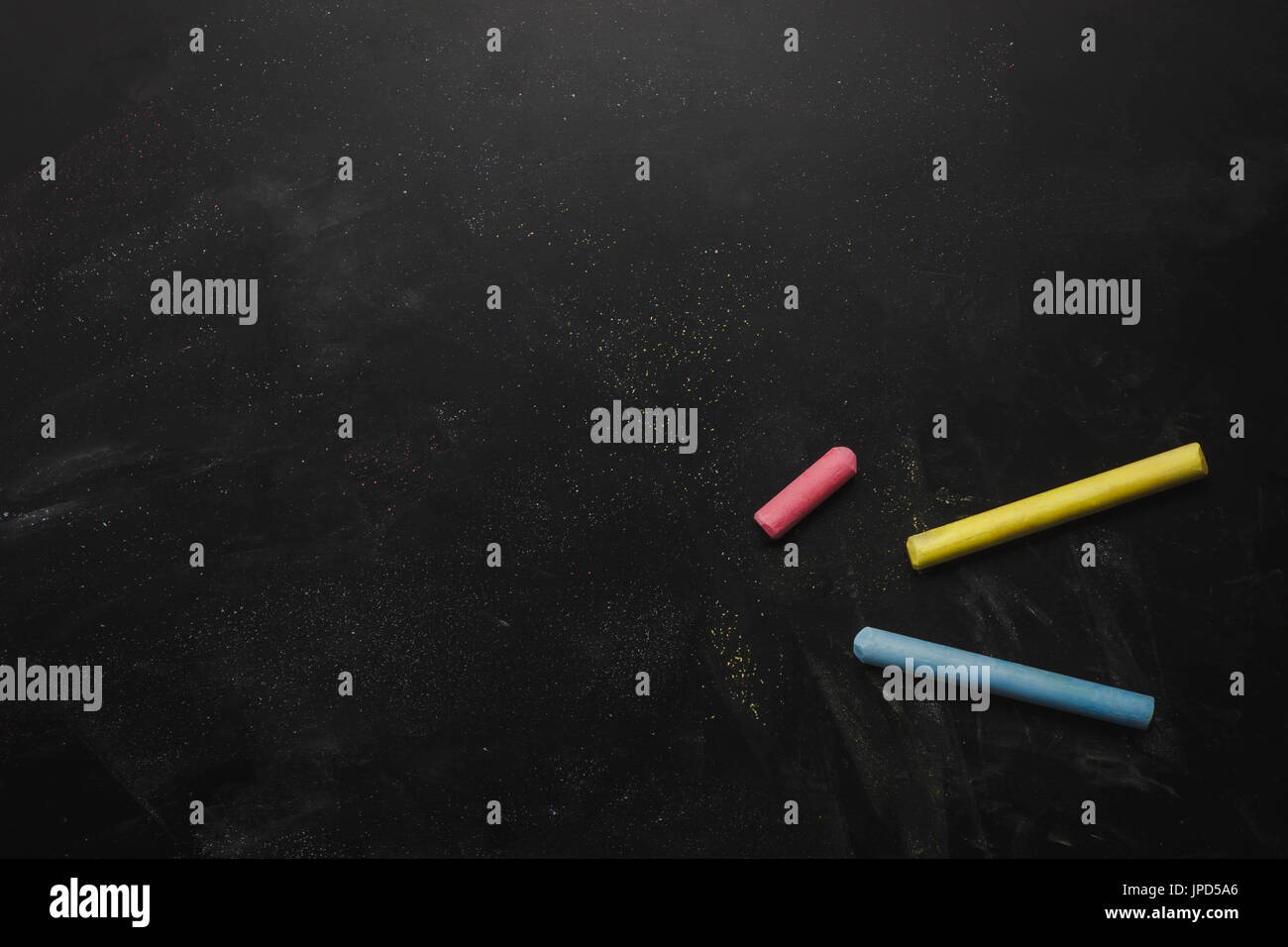 Top view / Flat lay colorful chalkboard on black board Stock Photo - Alamy