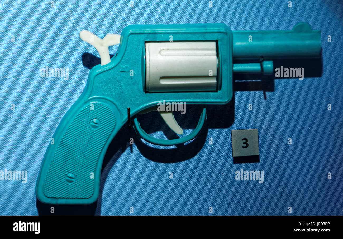 Plastic revolver hi-res stock photography and images - Alamy