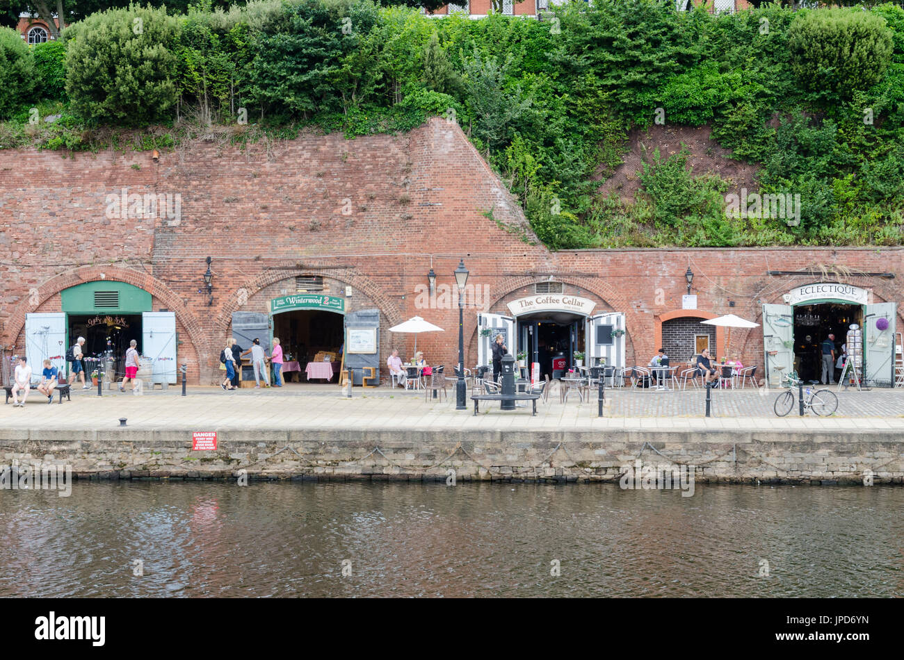 Shops and restaurants on The Quay on the bank of the River Exe in ...
