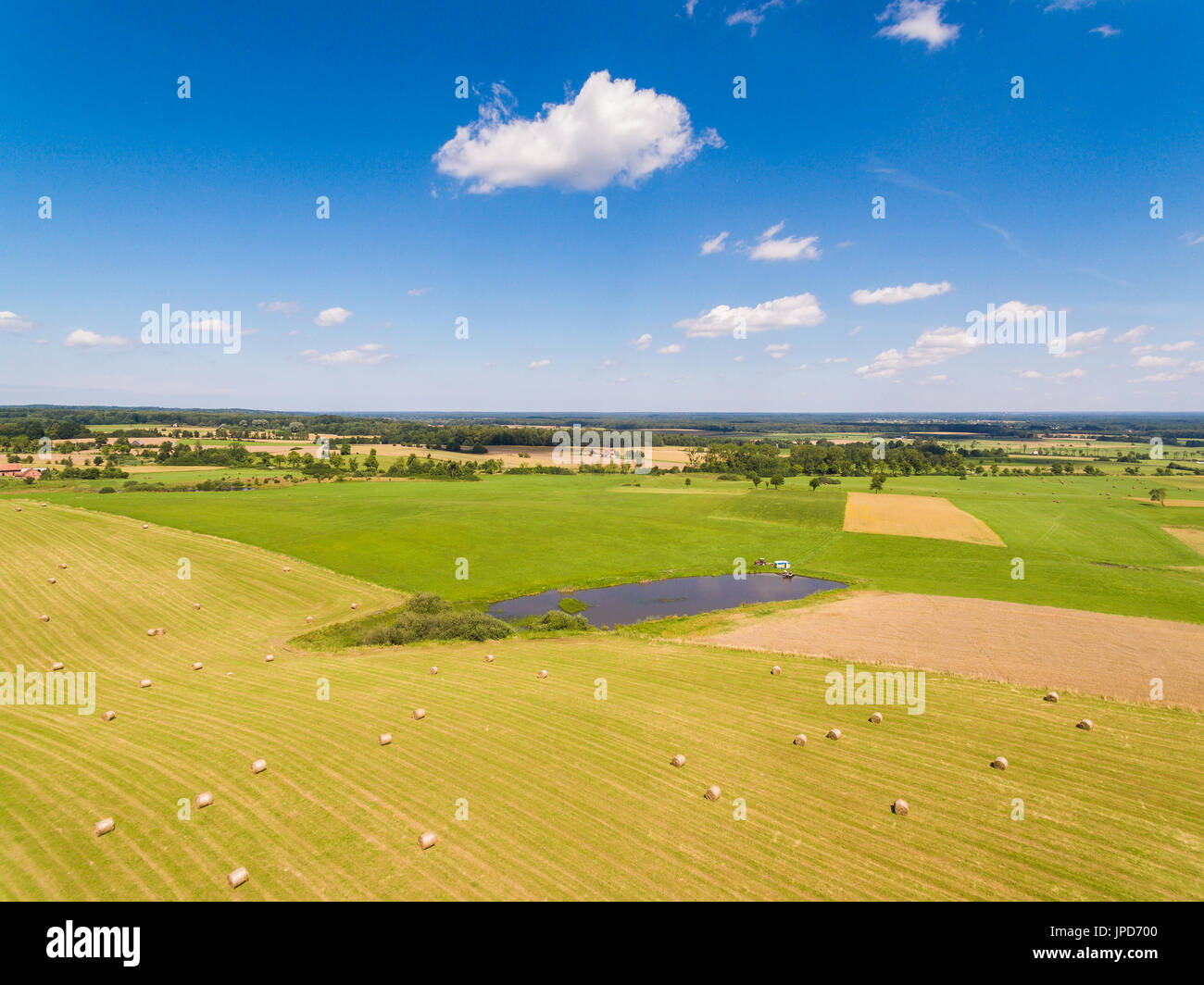 Field with haystacks in rural landscape, top view Stock Photo - Alamy