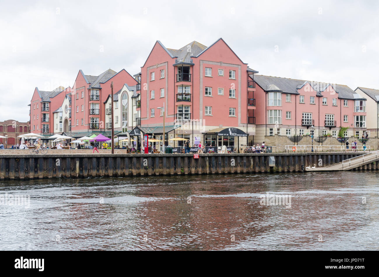 Shops and restaurants on The Quay on the bank of the River Exe in ...