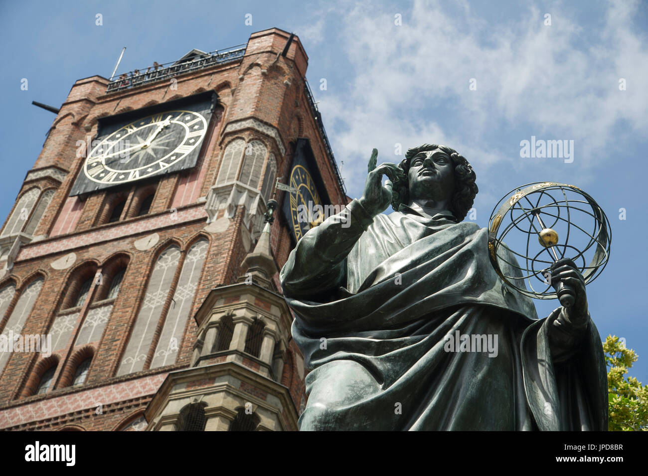 Statue of Nicolaus Copernicus and Old City Hall in Torun Old Town ...