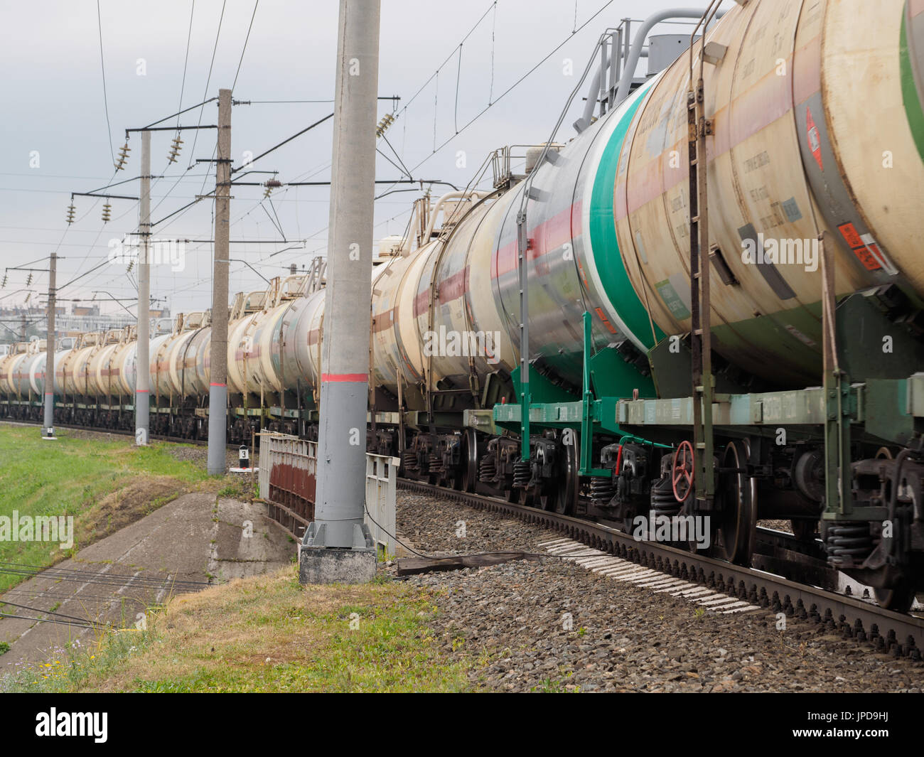 long train of fuel tanks moving through city in russia Stock Photo - Alamy