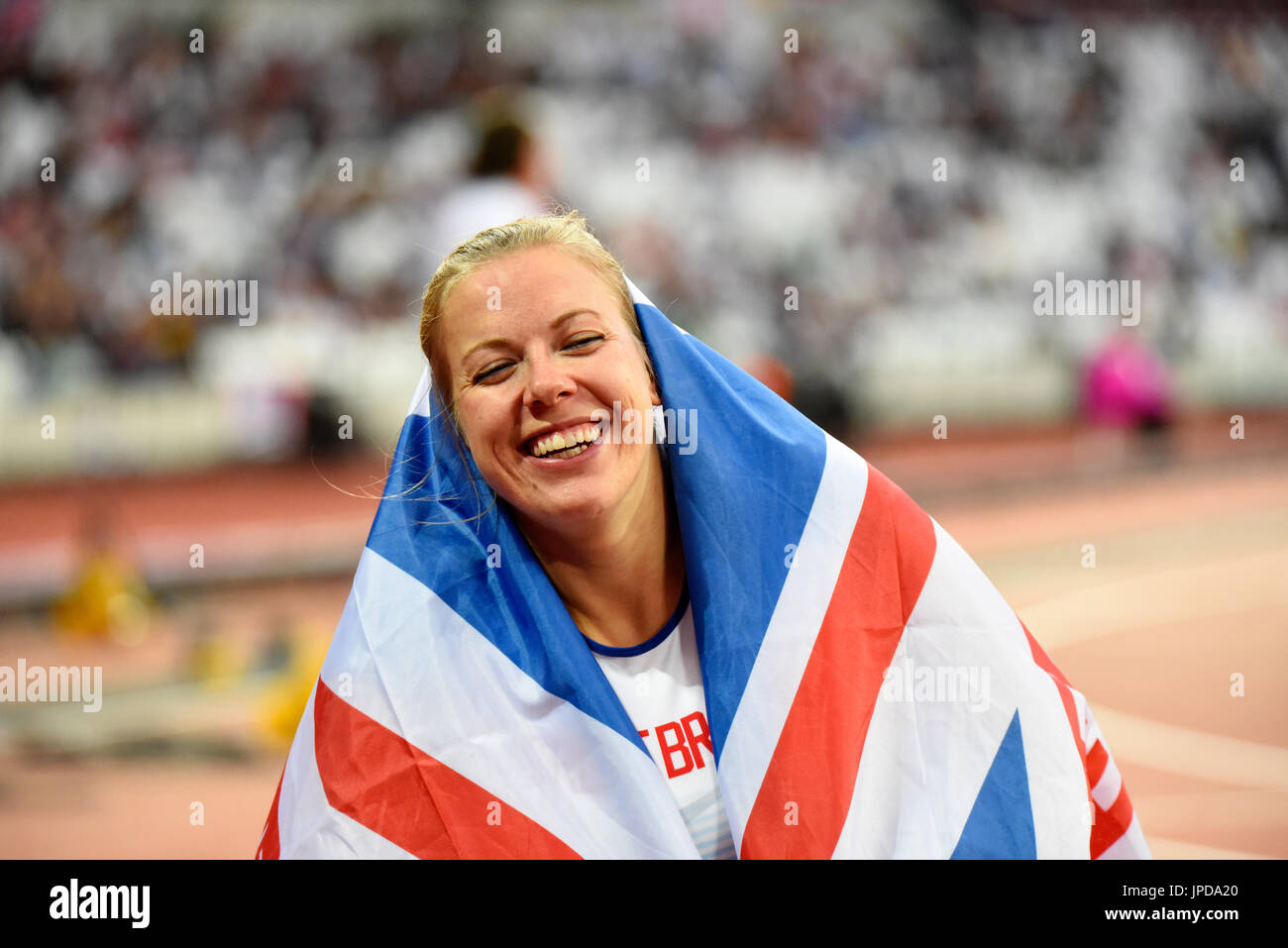 Hannah Cockroft celebrating with a union jack flag having won the 400m ...