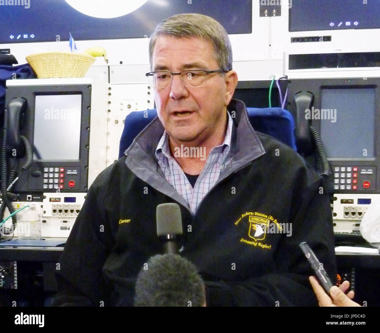 U.S. Defense Secretary Ashton Carter speaks to reporters aboard a plane ...