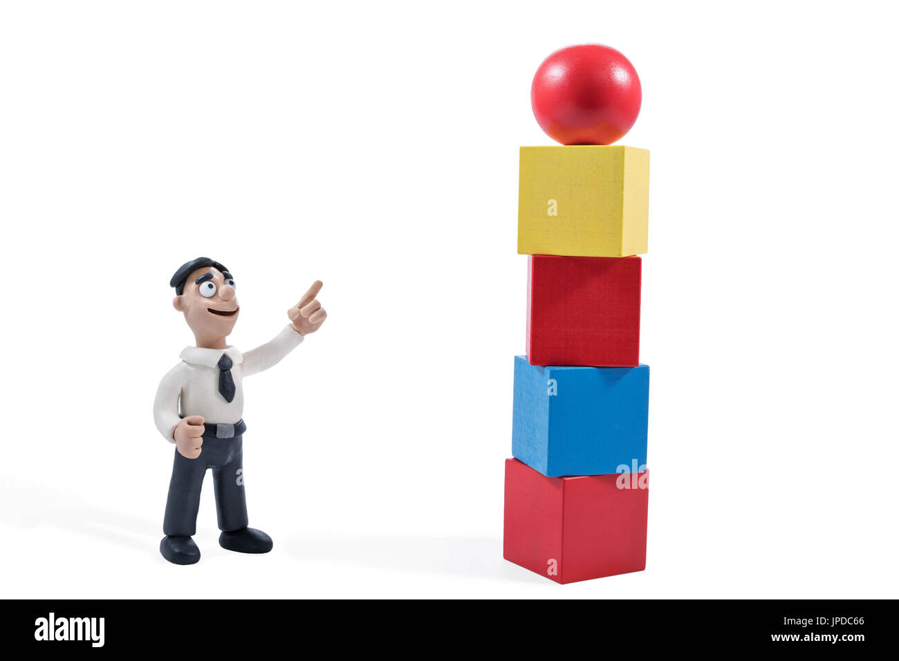 A tower of wooden building blocks Cut Out Stock Images & Pictures - Alamy