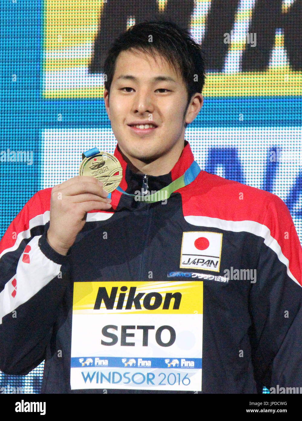 Japan's Daiya Seto holds his medal after capturing a third consecutive ...